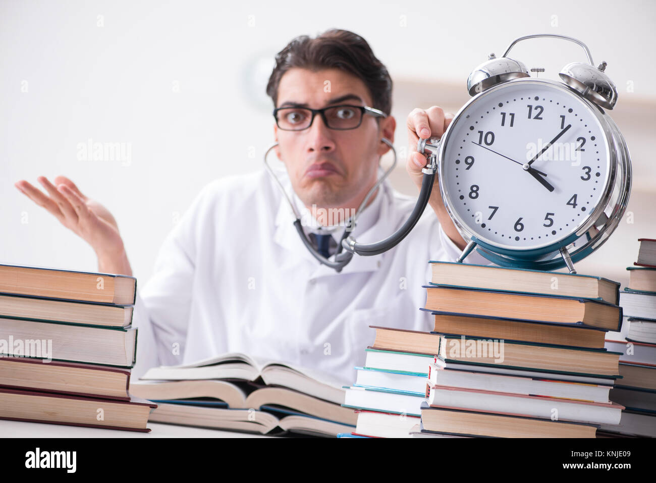 Medical student running out of time for exams Stock Photo - Alamy
