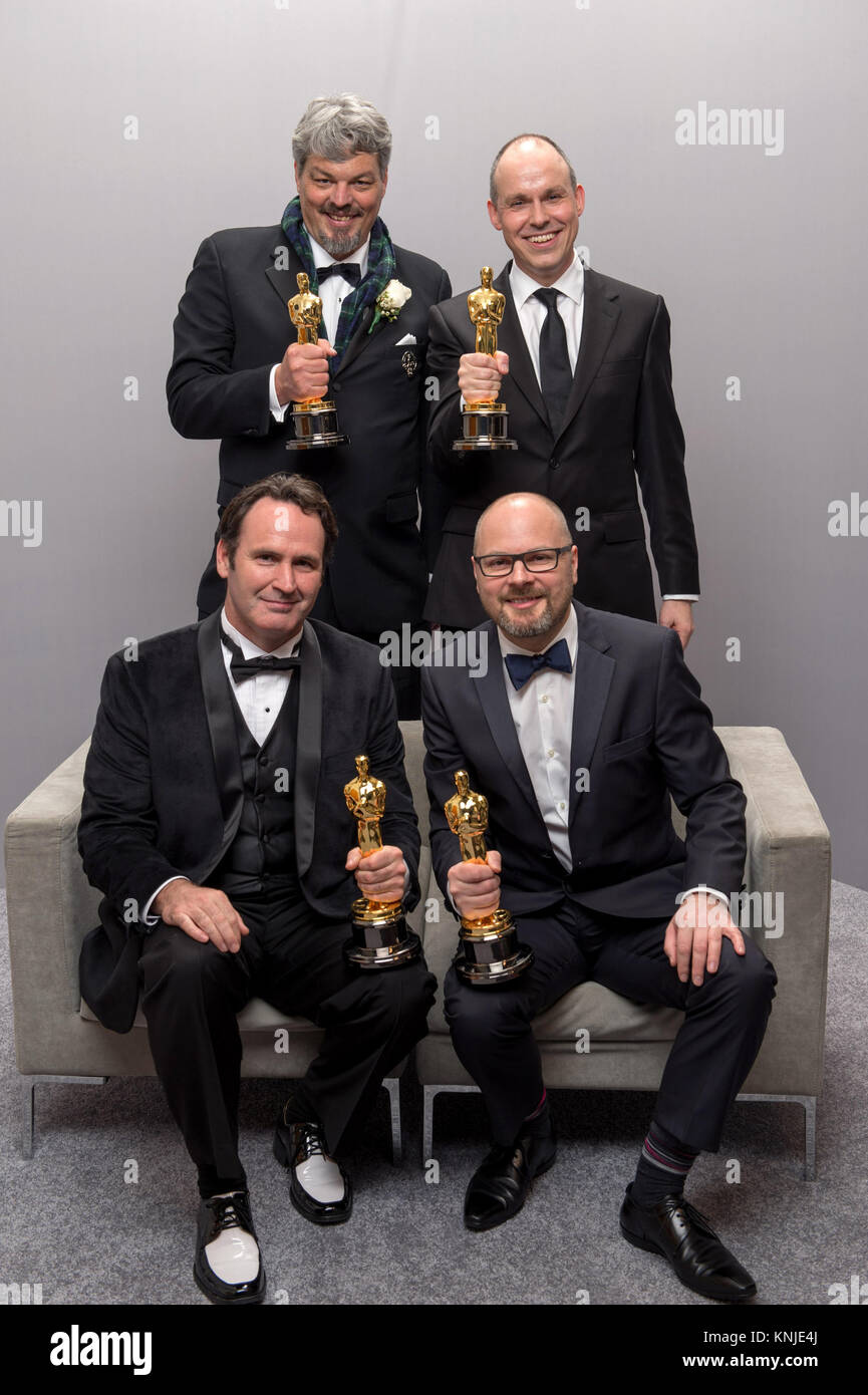 HOLLYWOOD, CA - FEBRUARY 22: Paul Franklin, Andrew Lockley, Ian Hunter ...