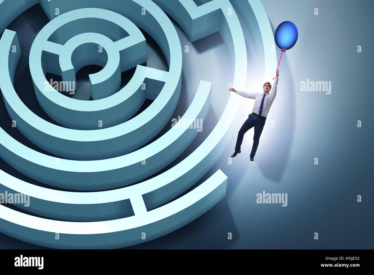 Businessman escaping from maze on balloon Stock Photo - Alamy