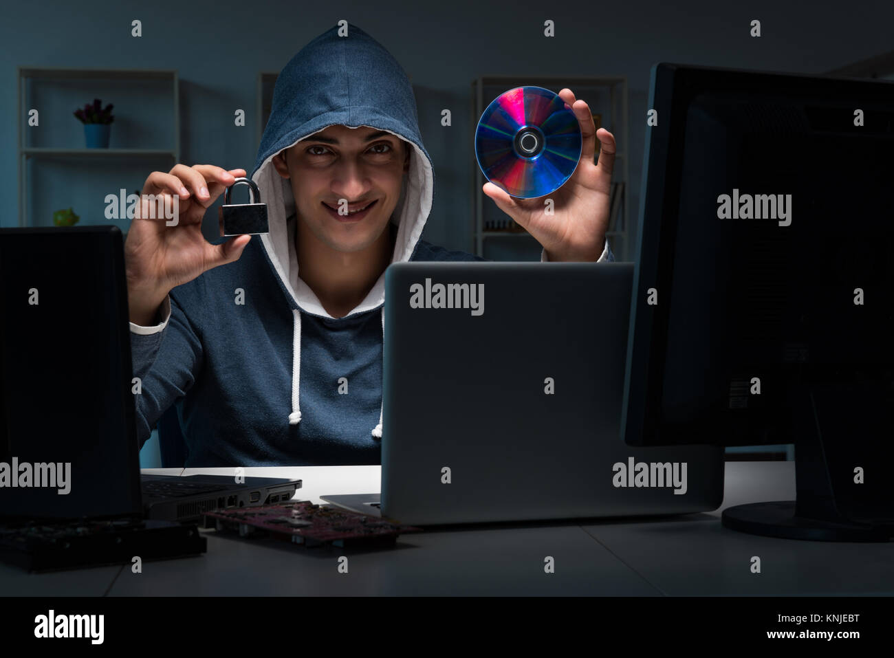 Hacker hacking computer at night Stock Photo - Alamy
