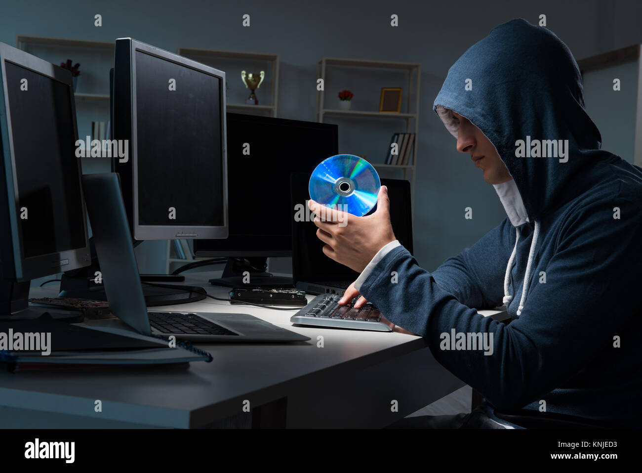 Hacker hacking computer at night Stock Photo - Alamy