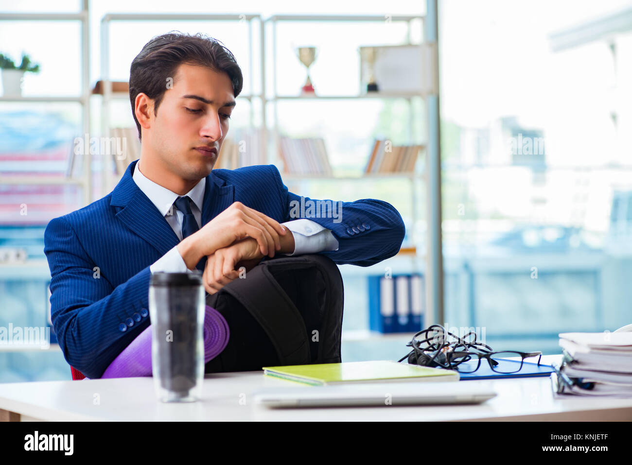 Man getting ready for sports break in the office Stock Photo - Alamy