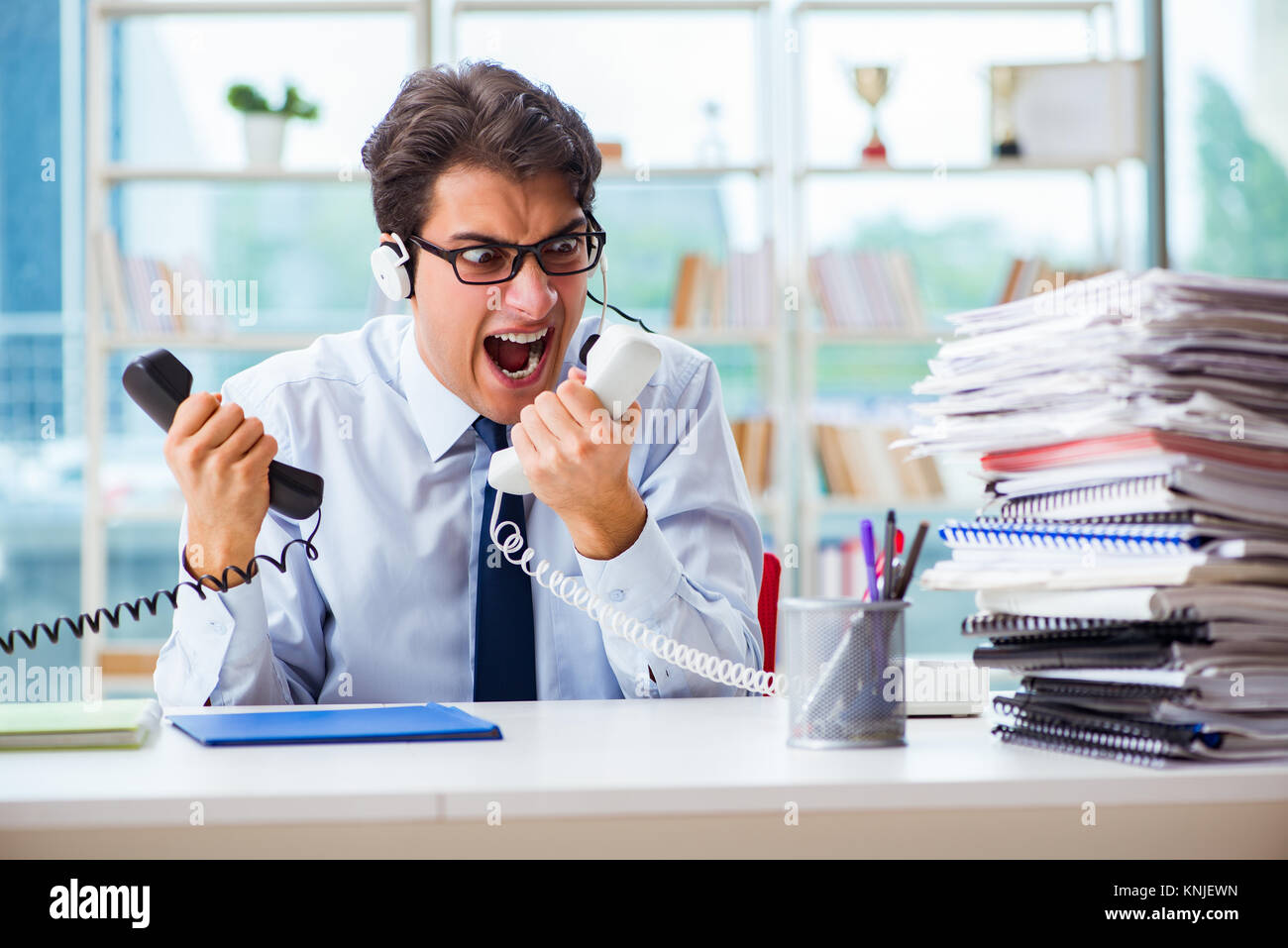 Call centre worker angry hi-res stock photography and images - Alamy
