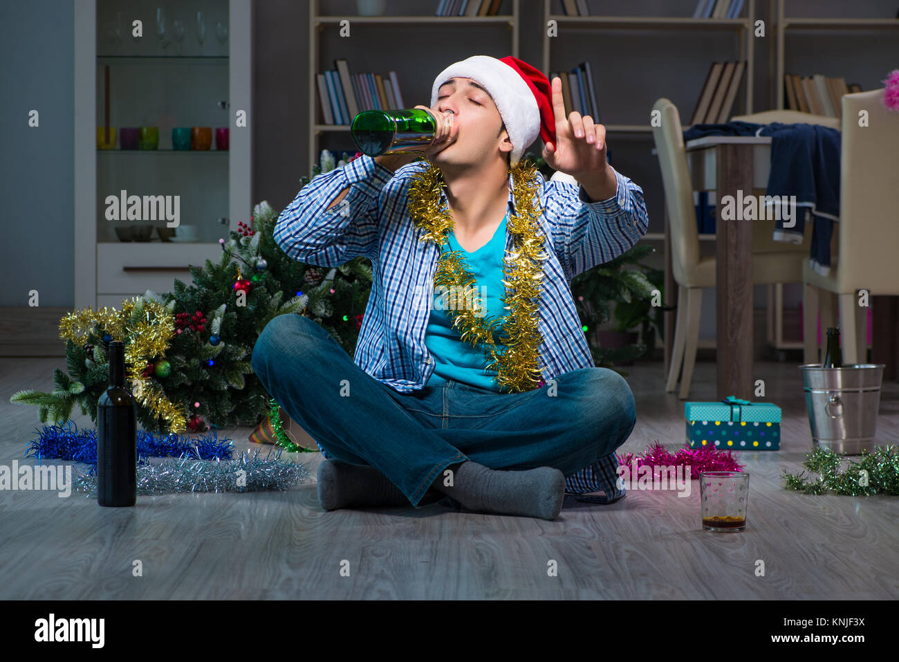 Man celebrating christmas at home alone Stock Photo - Alamy