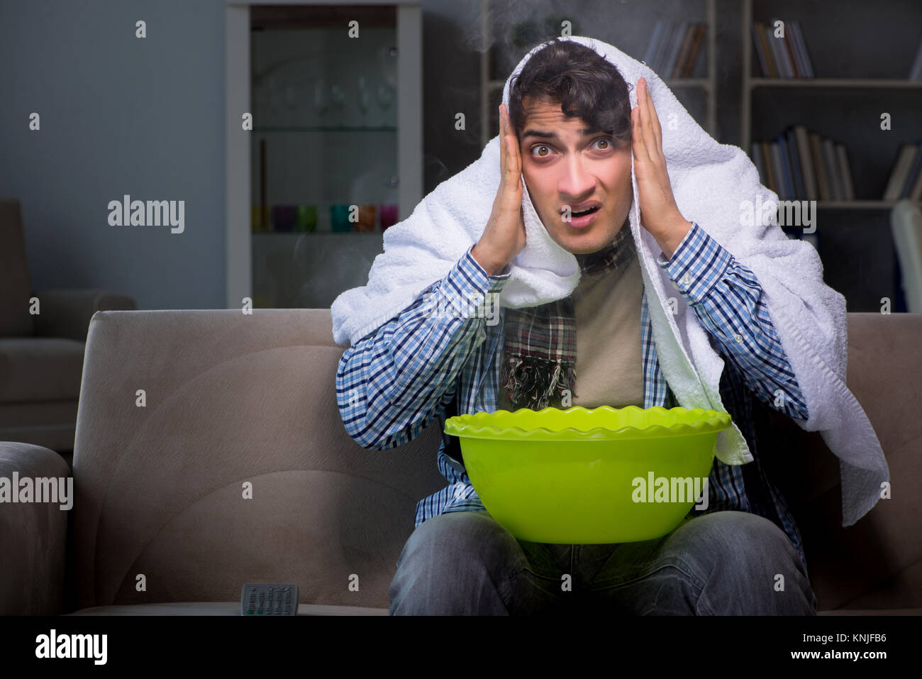 Sick man doing inhalation at night in home Stock Photo - Alamy