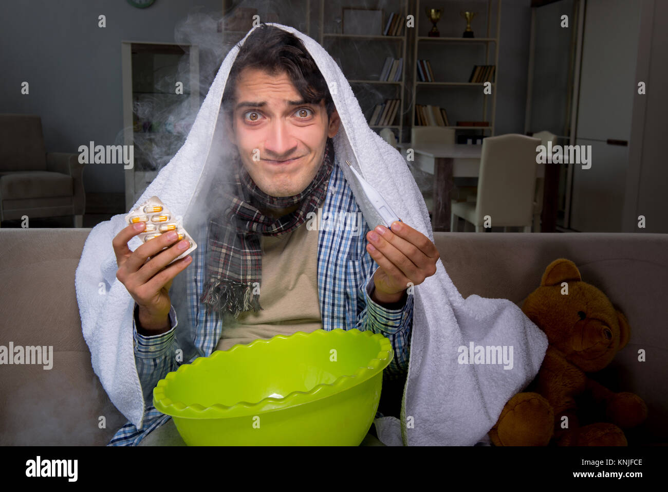Sick man doing inhalation at night in home Stock Photo - Alamy
