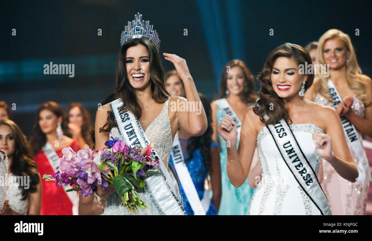 DORAL, FL - JANUARY 25: Nia Sanchez, Miss USA 2014 congratulates ...