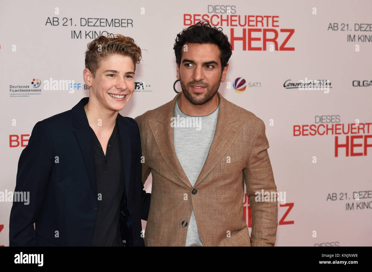 Munich, Germany. 11th Dec, 2017. Actors Elyas M'Barek (R) and Philip ...