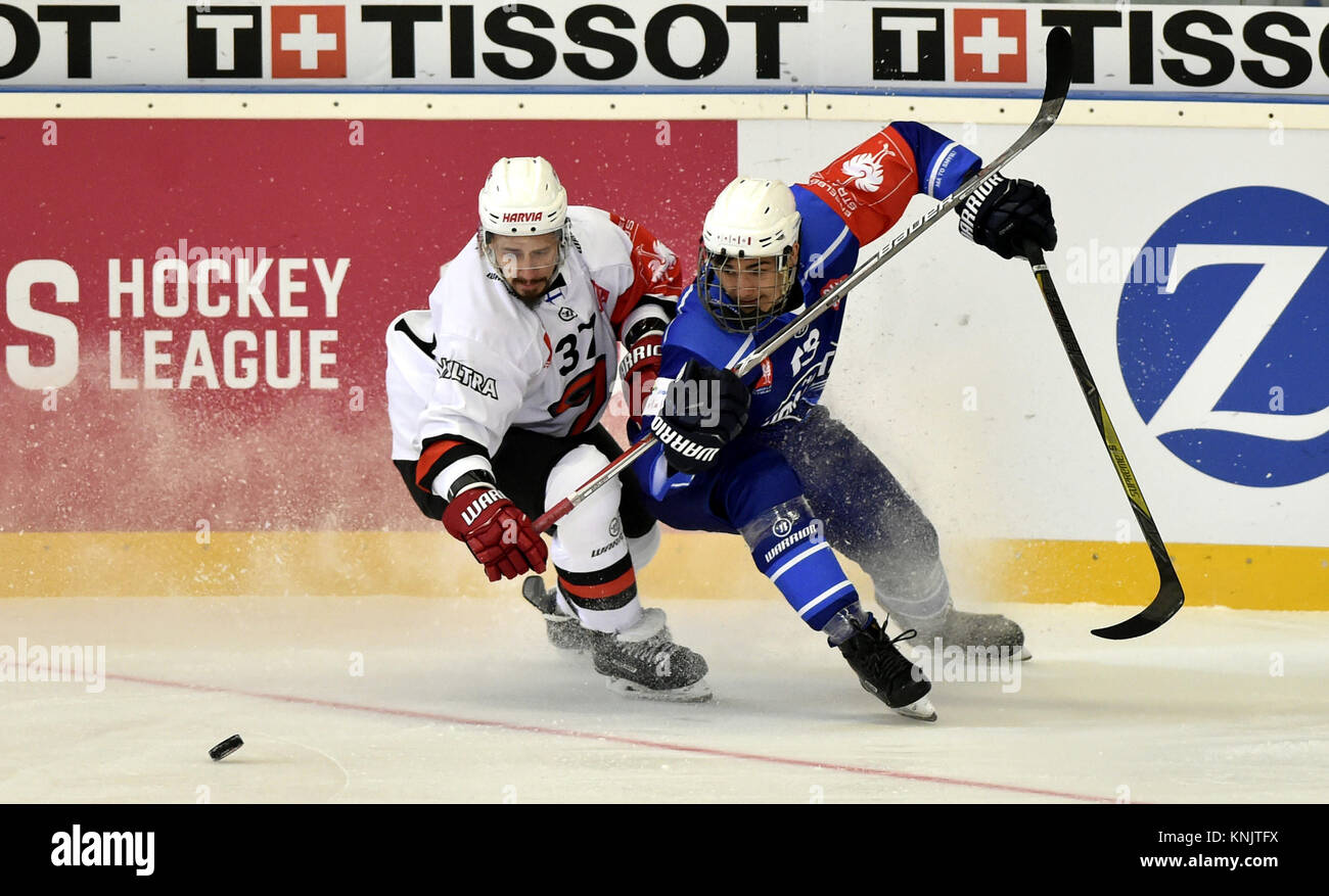 Ossi Ikonen of JYP Jyvaskyla, left, and Adam Gajarsky of Brno in action ...