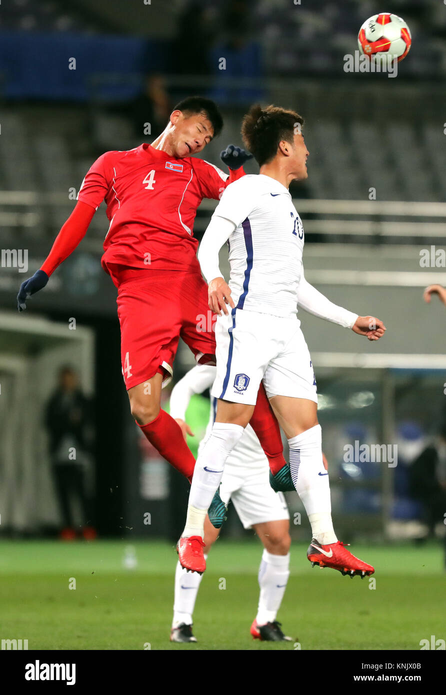 Tokyo, Japan. 12th Dec, 2017. North Korea's Pak Myong Son (L) and South ...