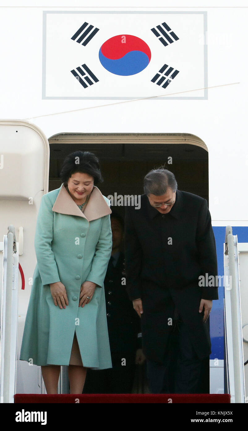 13th Dec, 2017. Moon heads to China President Moon Jae-in (R) and first ...