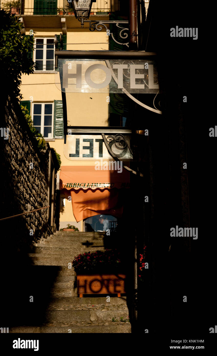 A shadow impression of the word hotel in a charming rustic side street ...