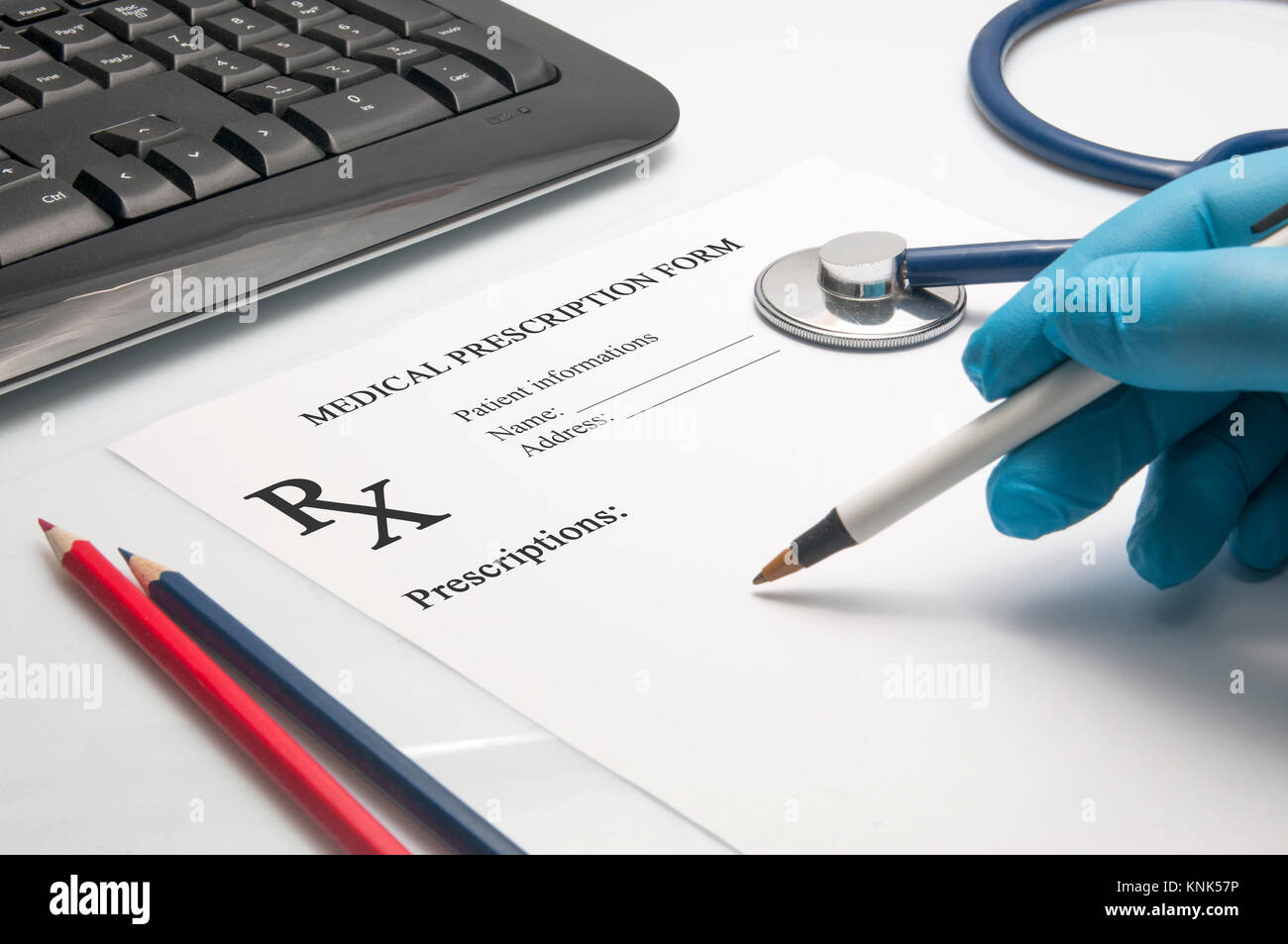 Doctor with latex gloves prescribing recipe for medical treatment ...