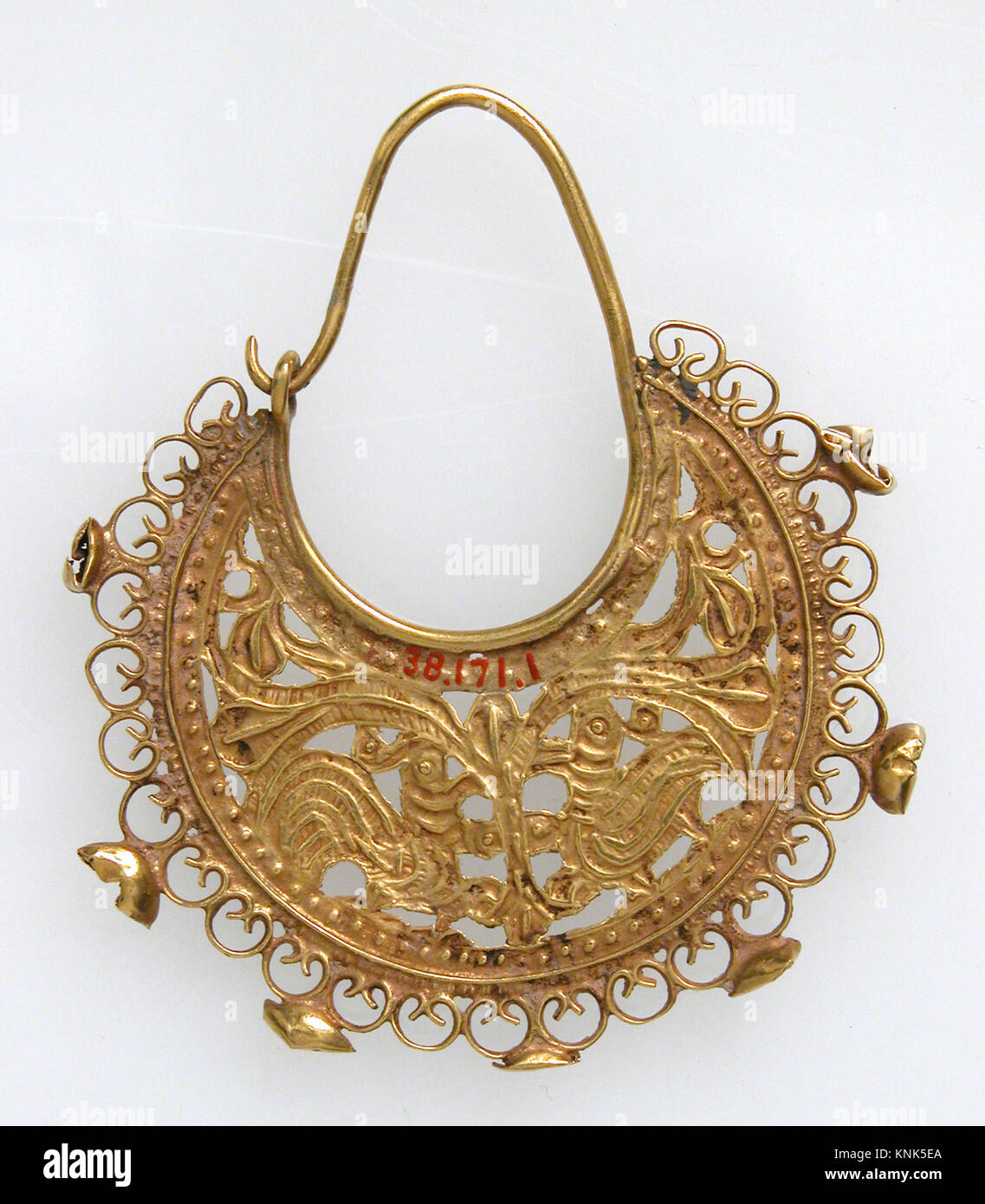 Gold half moon shaped earring hi-res stock photography and images - Alamy