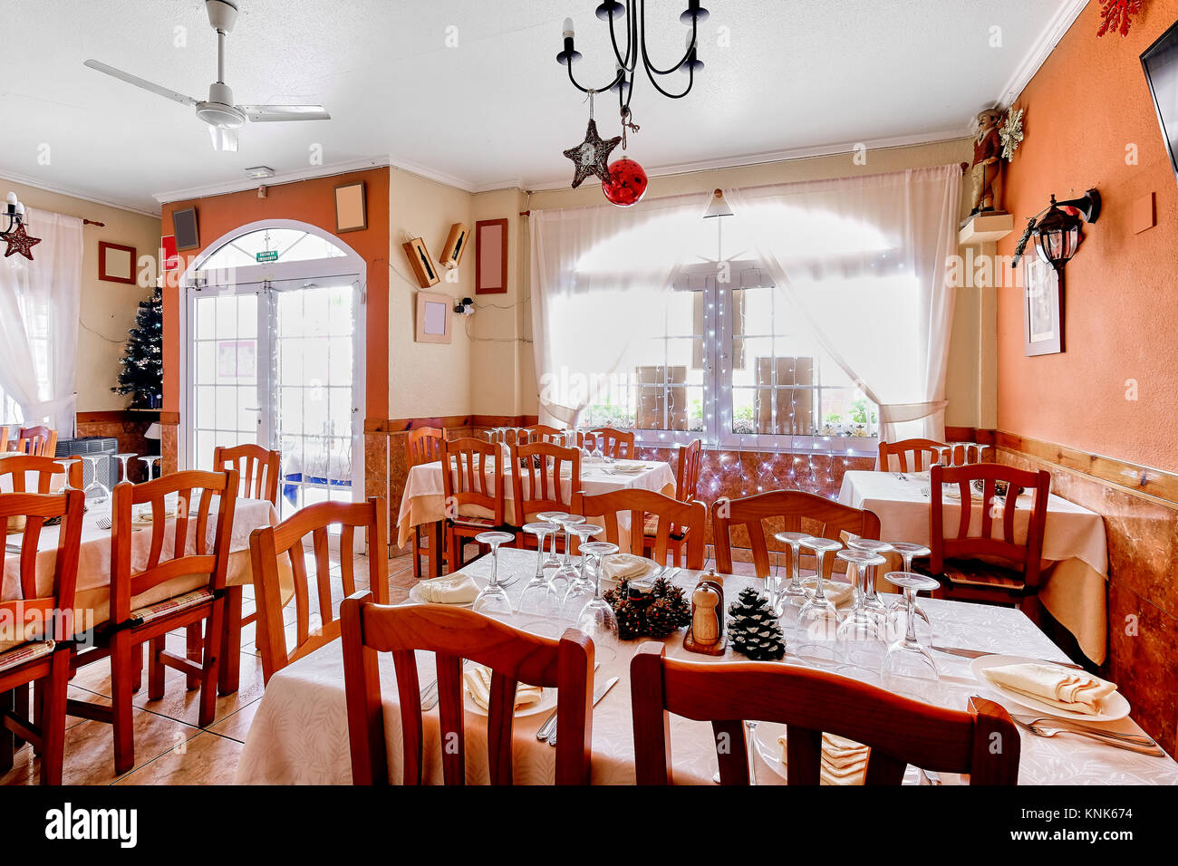 Restaurant interior with Christmas decorations Stock Photo - Alamy