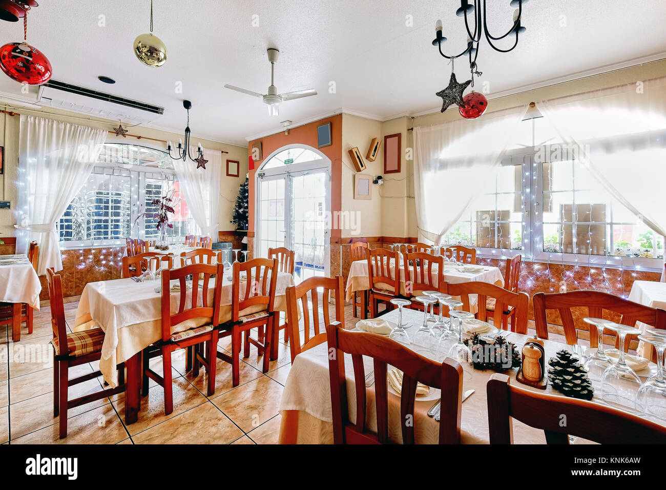 Restaurant interior with Christmas decorations Stock Photo - Alamy