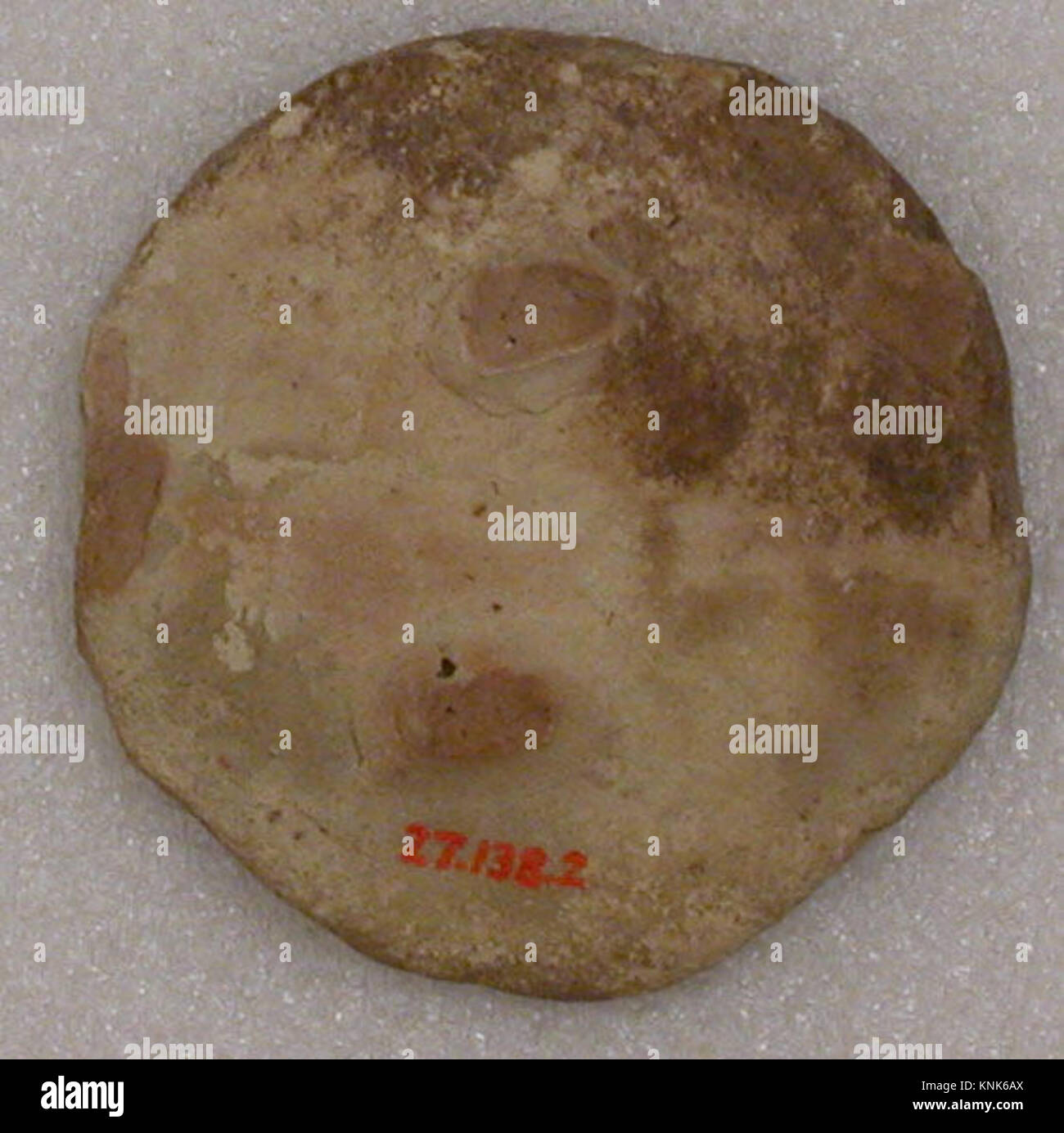 This MET bread seal, sf27-138-2b, is a stamped artifact historically ...