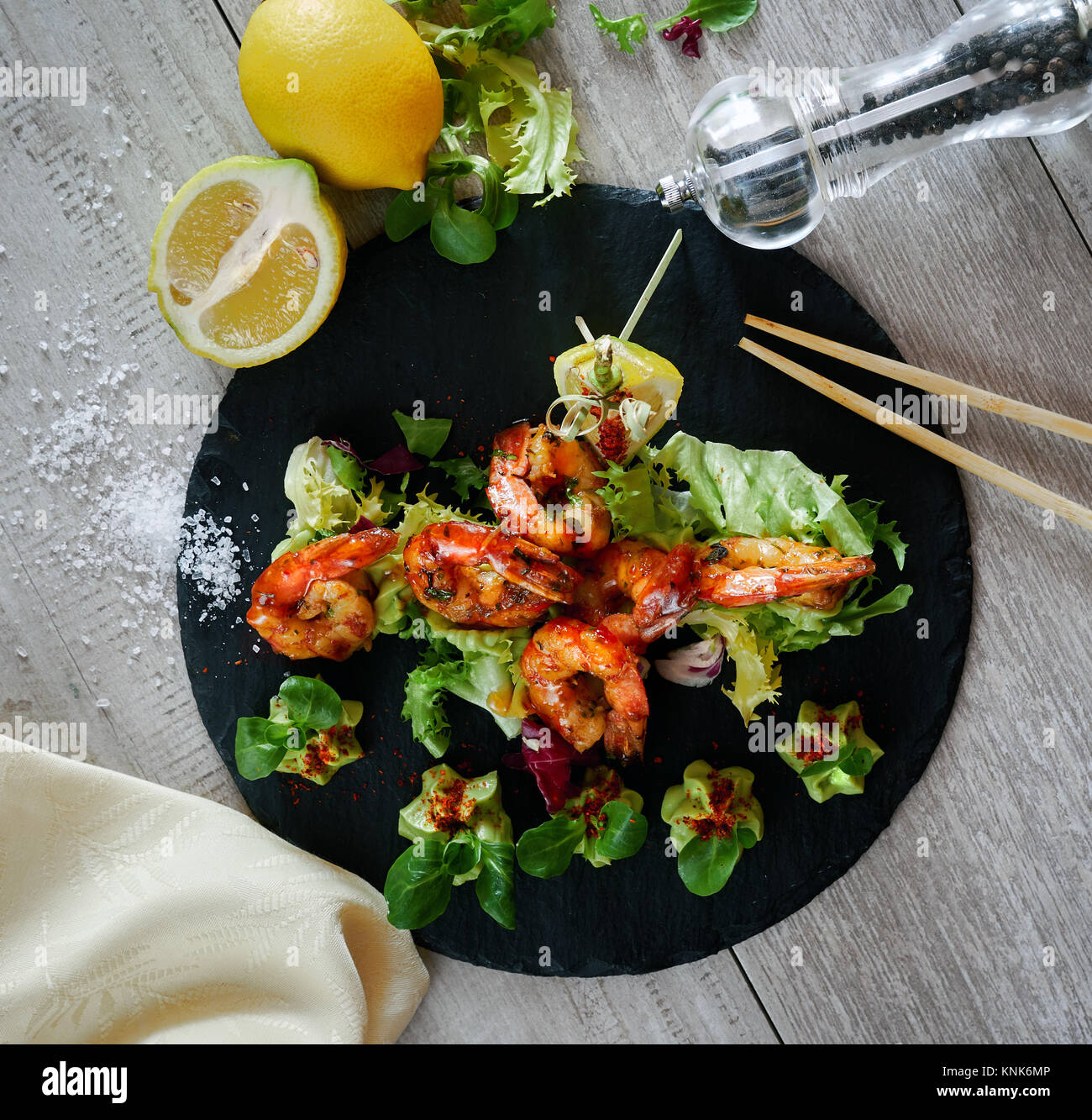 Barbecue grilled prawns with guacamole salad Stock Photo - Alamy