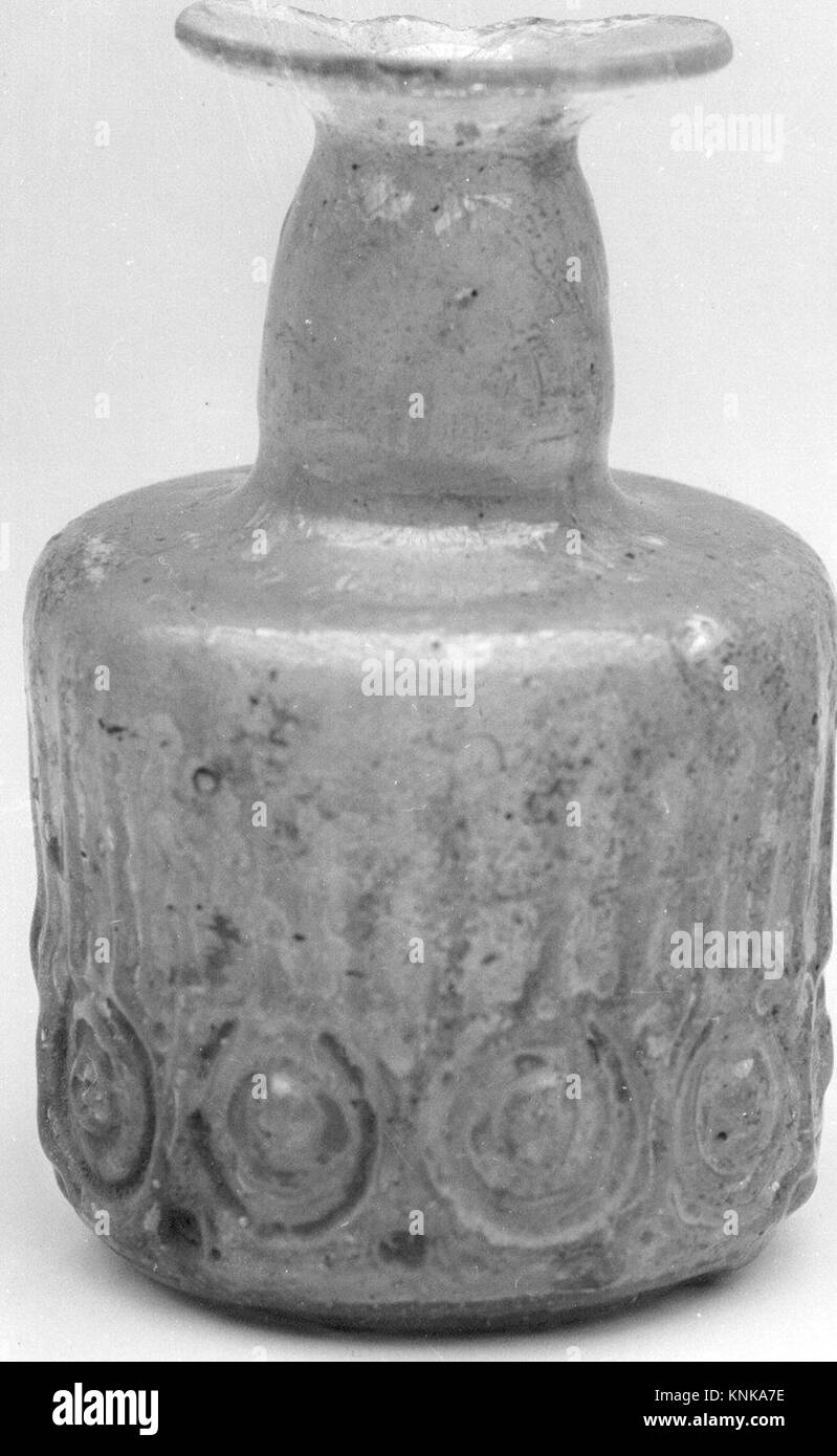 This 10th-11th century Egyptian glass bottle is mold-blown ...