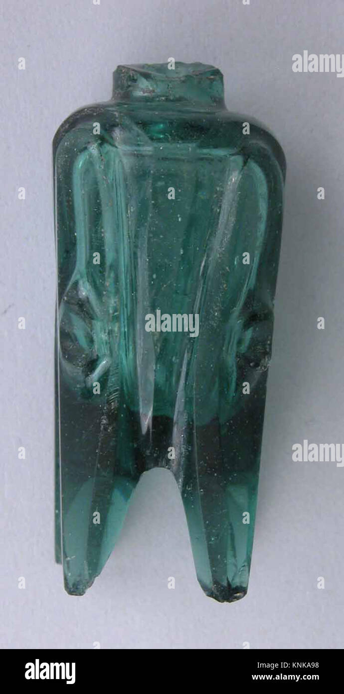 A cut glass bottle from 9th–11th century Egypt, exemplifying advanced ...