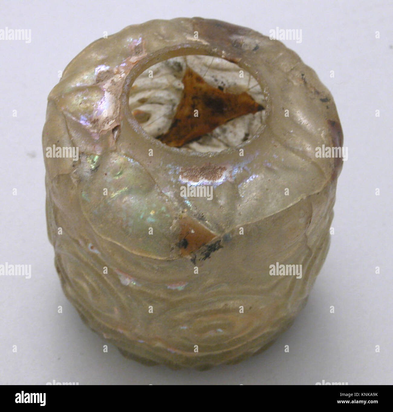 This 11th–12th century Iranian glass bottle, made using mold-blown ...