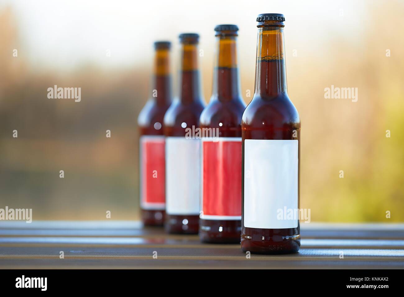 Beer bottles on a table Stock Photo - Alamy