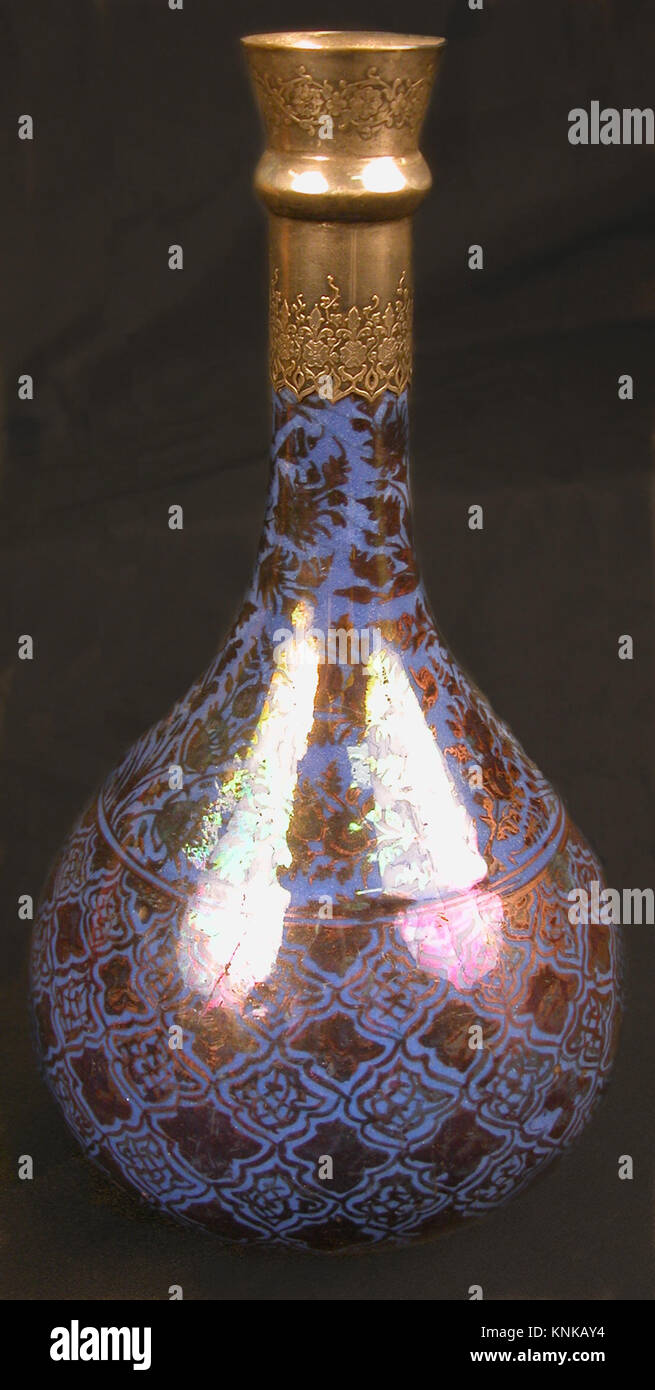 This 17th-century Iranian bottle is made of stonepaste, featuring a ...