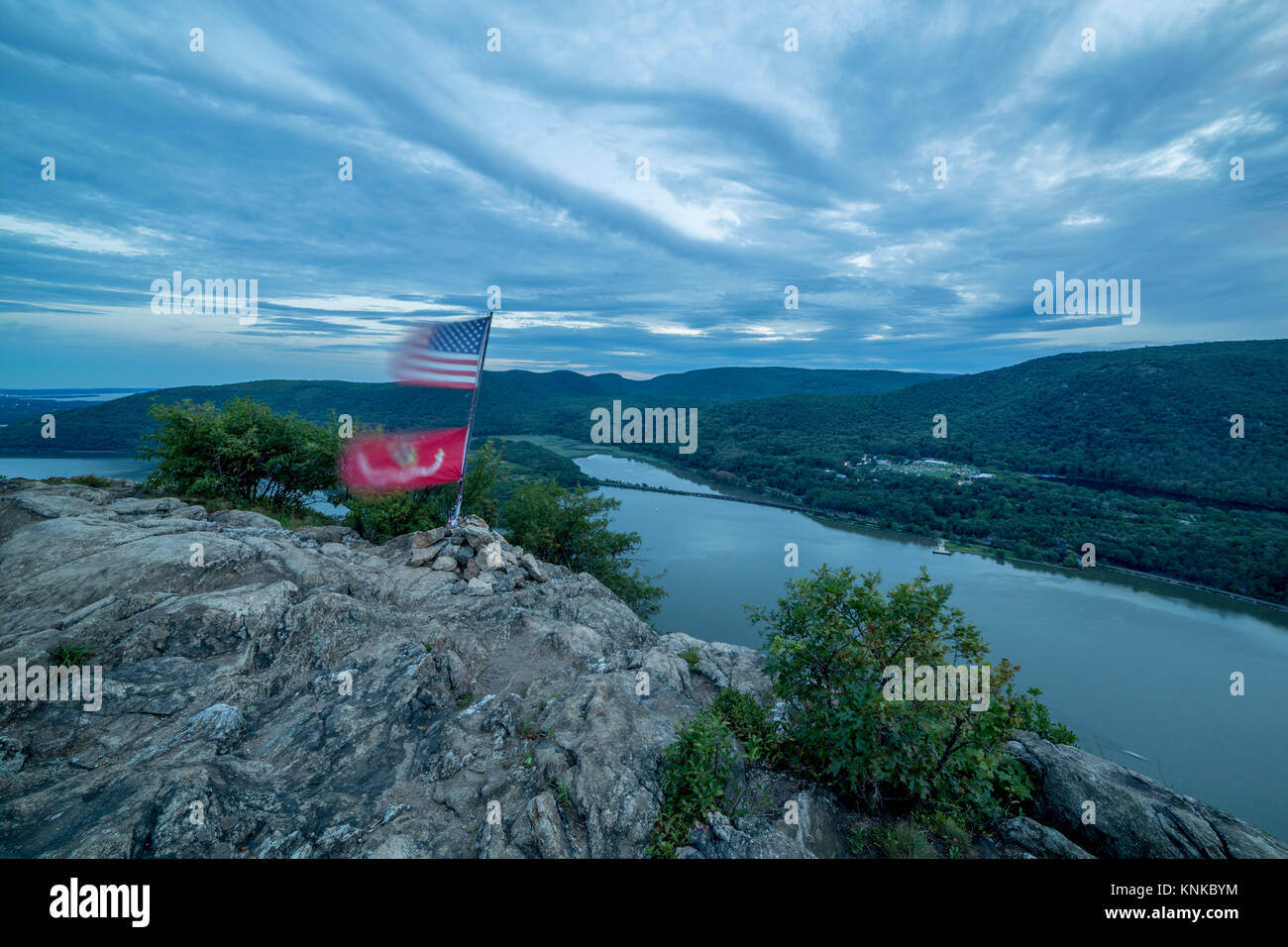 American and United States Marine Corps flags fly from Anthony's Nose ...