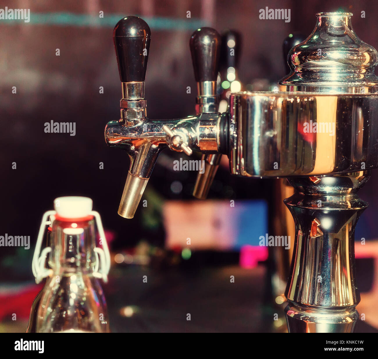 Beer taps in row at restaurant or pub. Food and beverages concept Stock ...