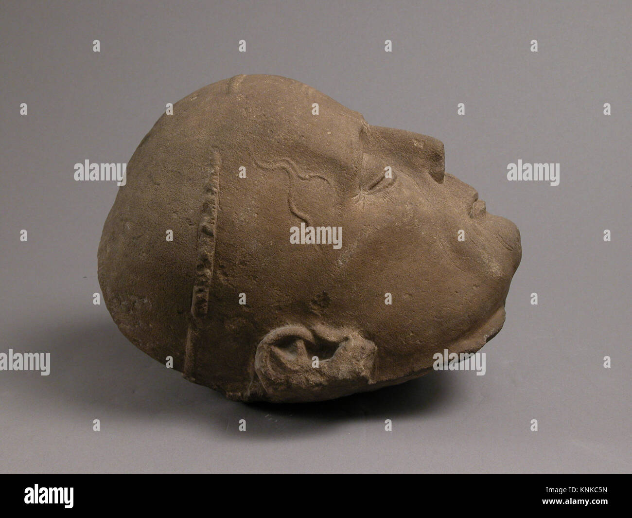 This effigy head of a cleric in red sandstone originates from 15th ...