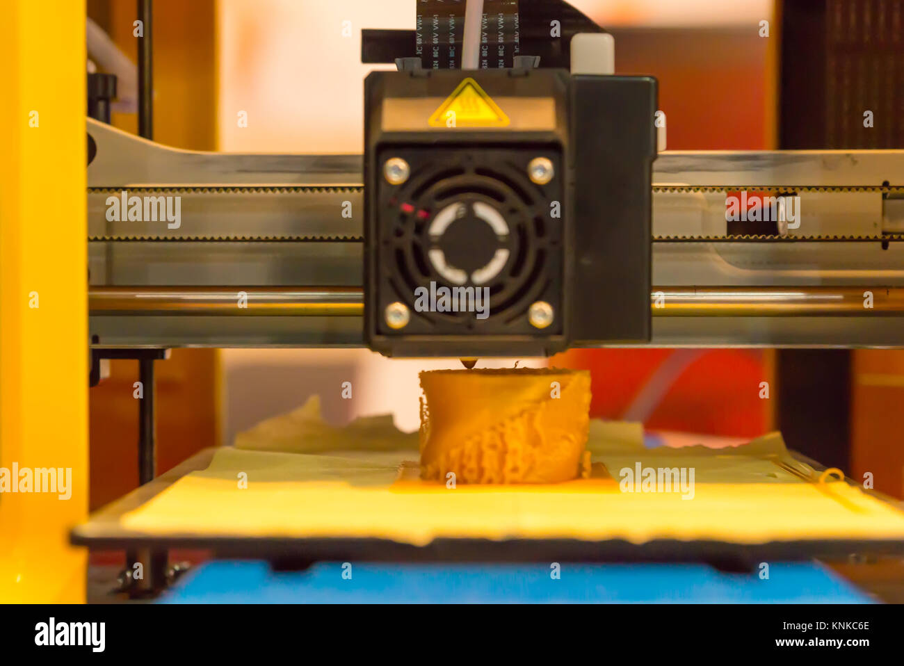 Close up of 3d printing machine printing a piece of plastic Stock Photo ...