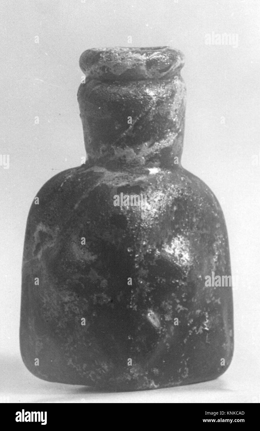 A 7th-8th century mold-blown glass flask from Iraq or Syria ...