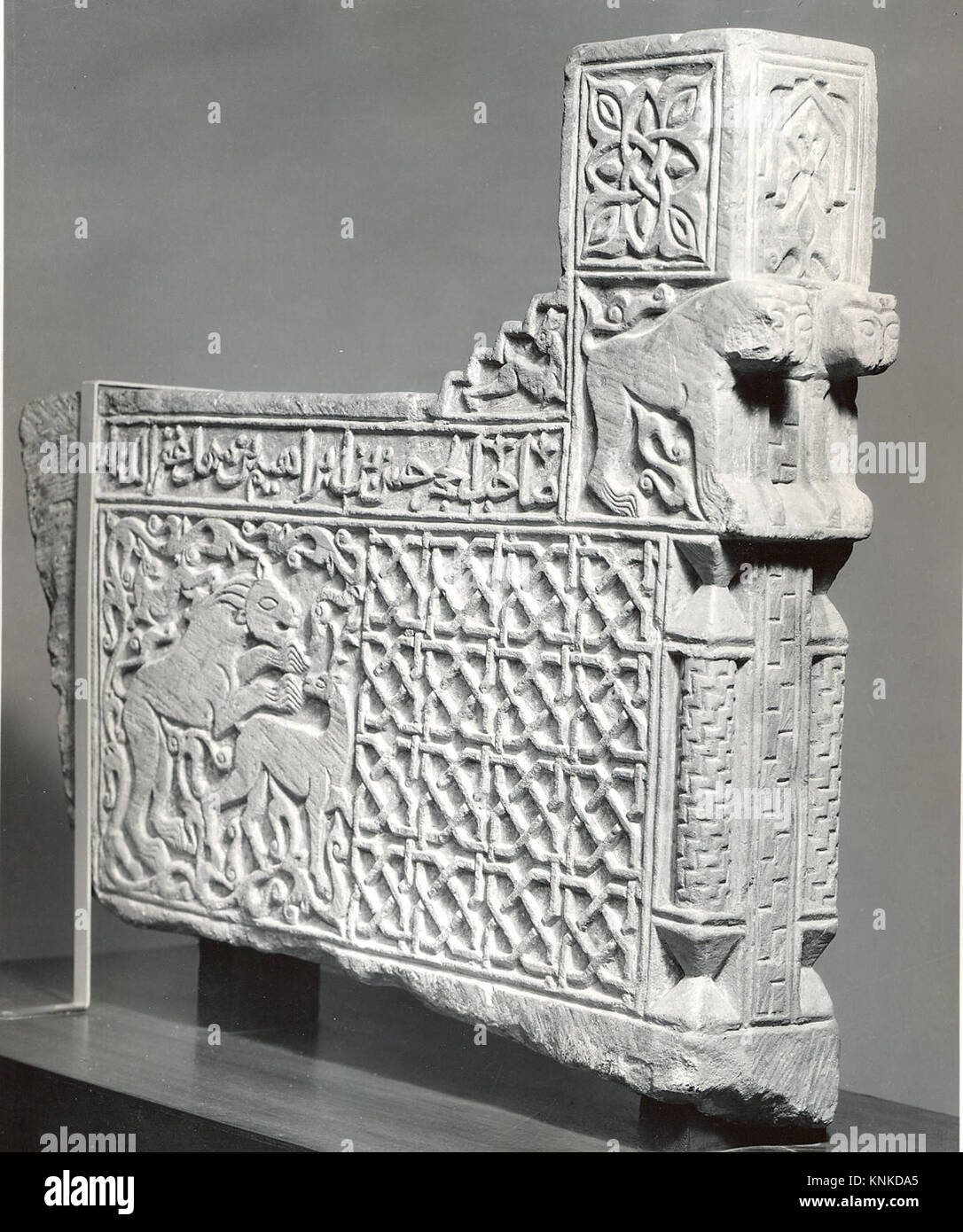 Iranian carved limestone balustrade end from 1303-4 CE, showing ...