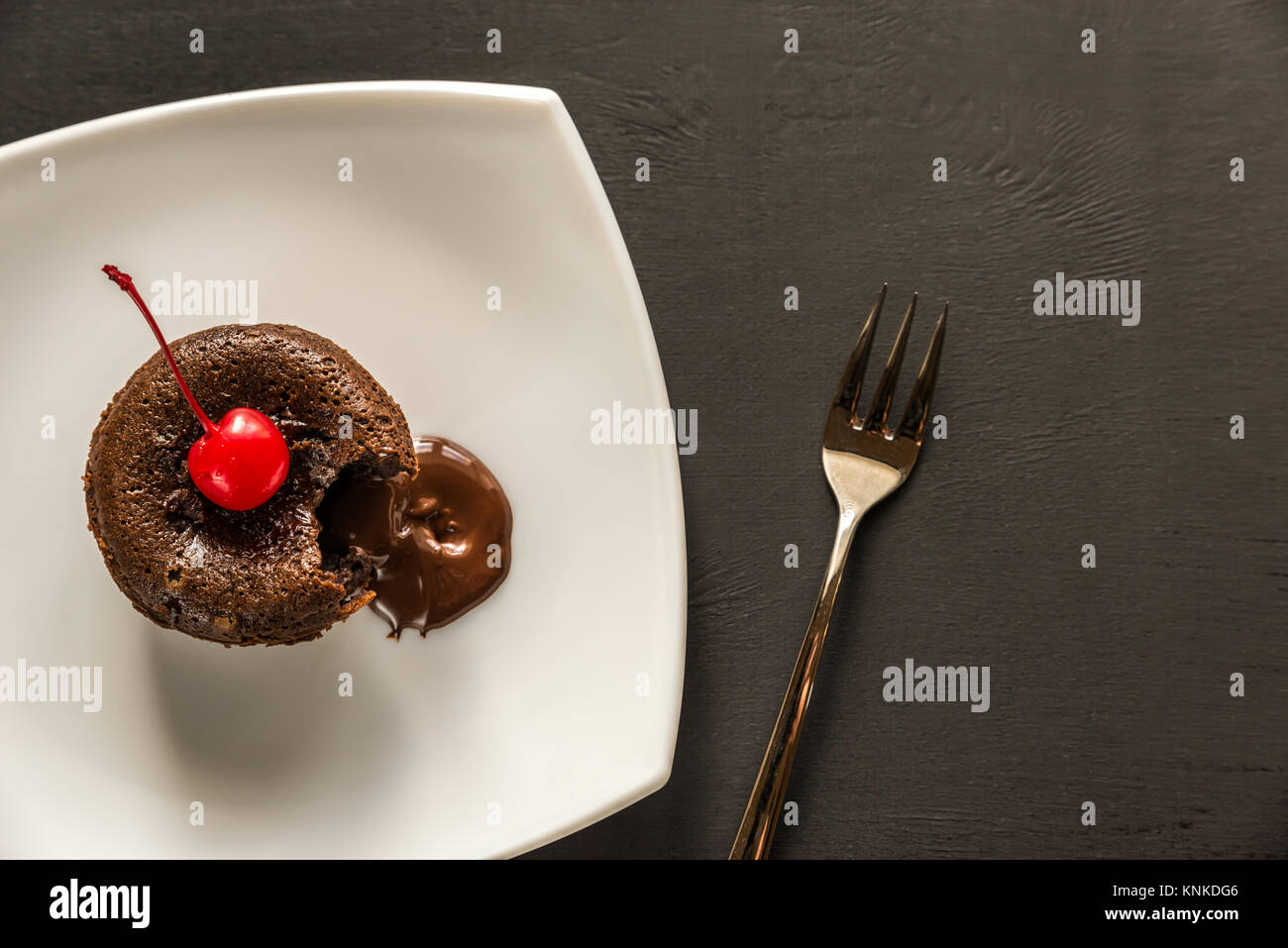 Fondant decorated with cocktail cherry Stock Photo - Alamy