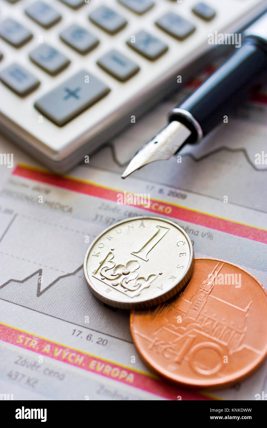 Finance and economy, foreign currency coins on the business newspaper ...