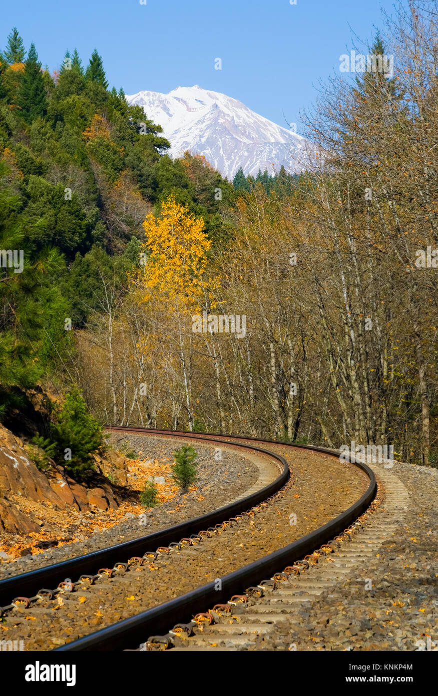 Rail tracks through the mountains Stock Photo - Alamy