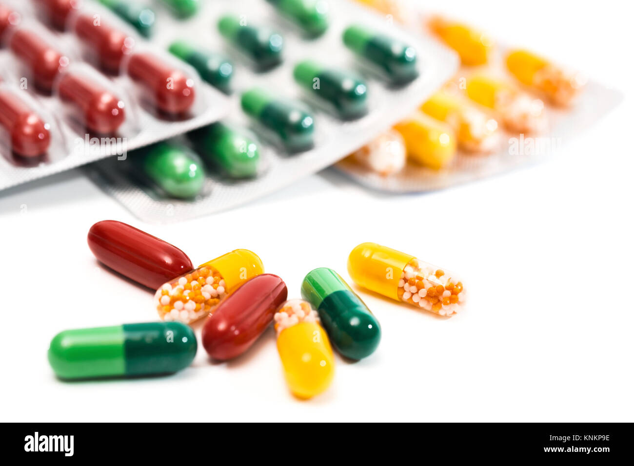 Assorted pills or capsules with medications on white background Stock ...