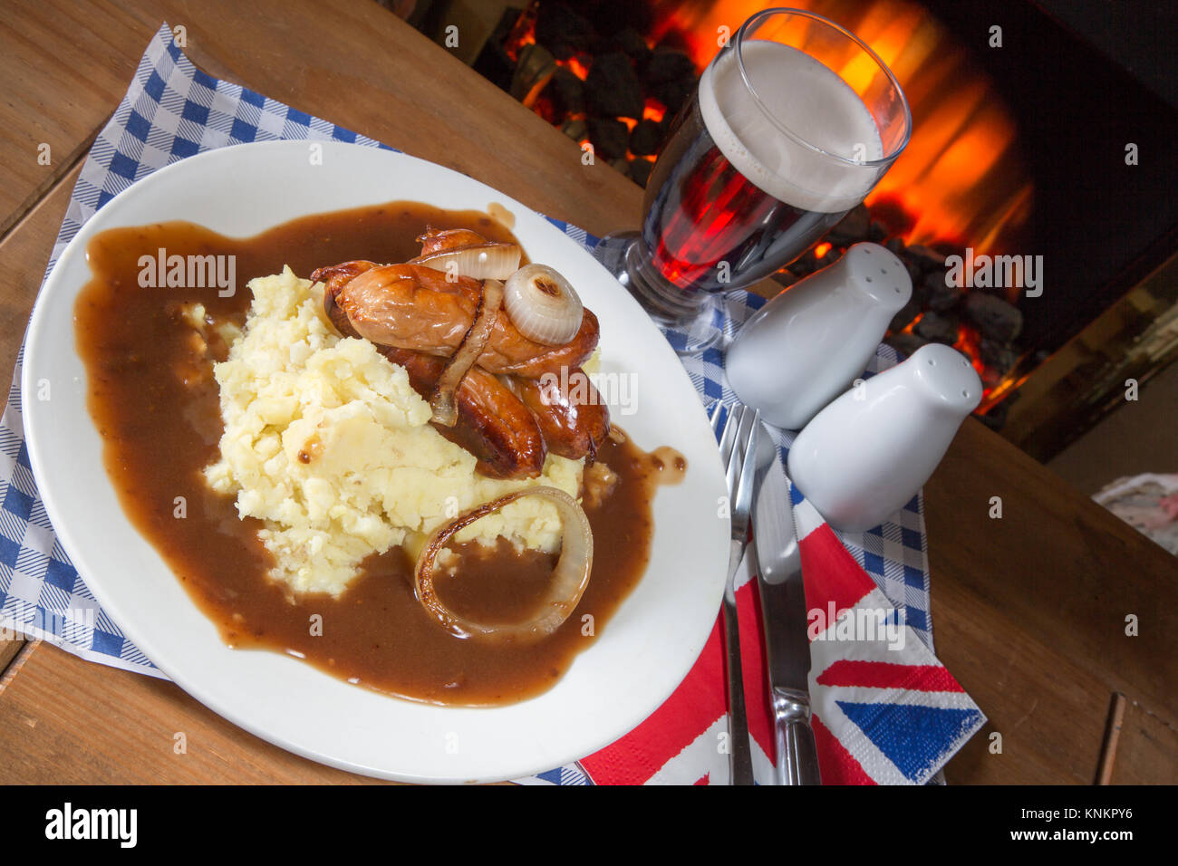 An English pub/restaurant dish of Sausage, Mashed potato and gravy ...