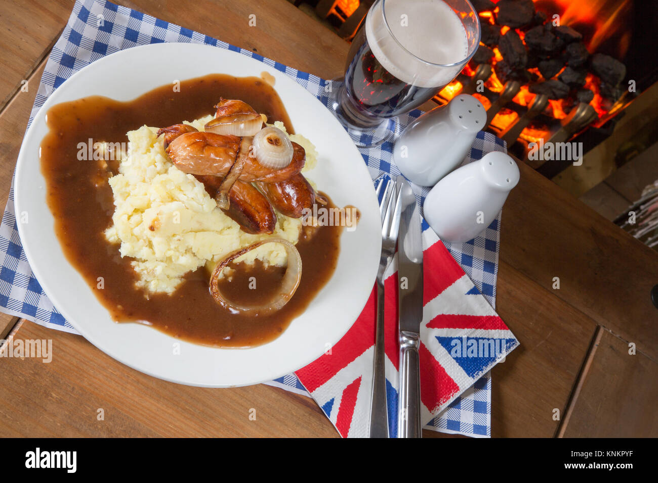 An English pub/restaurant dish of Sausage, Mashed potato and gravy ...