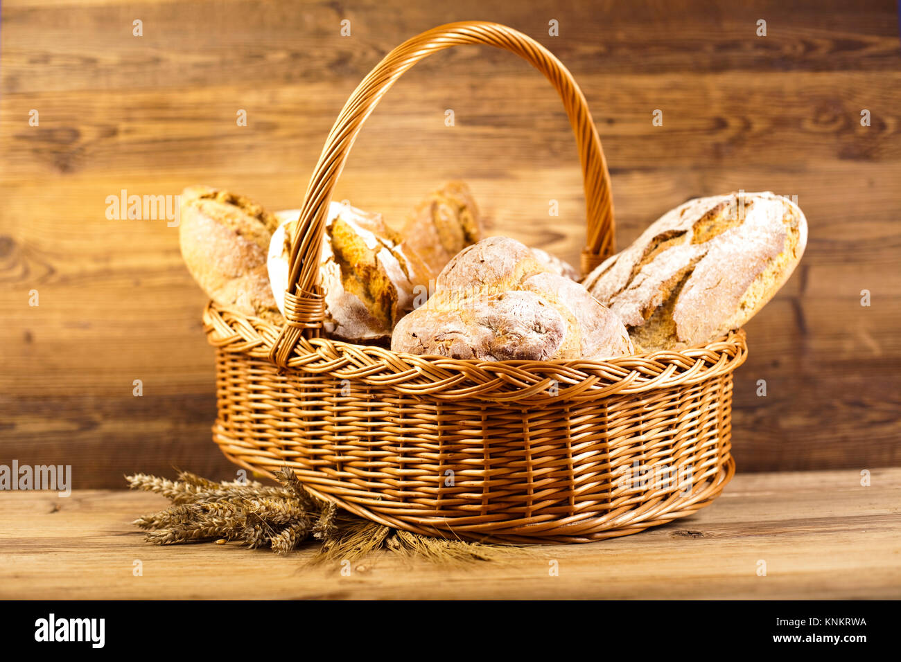 Baked bread in basket, natural colorful tone Stock Photo - Alamy