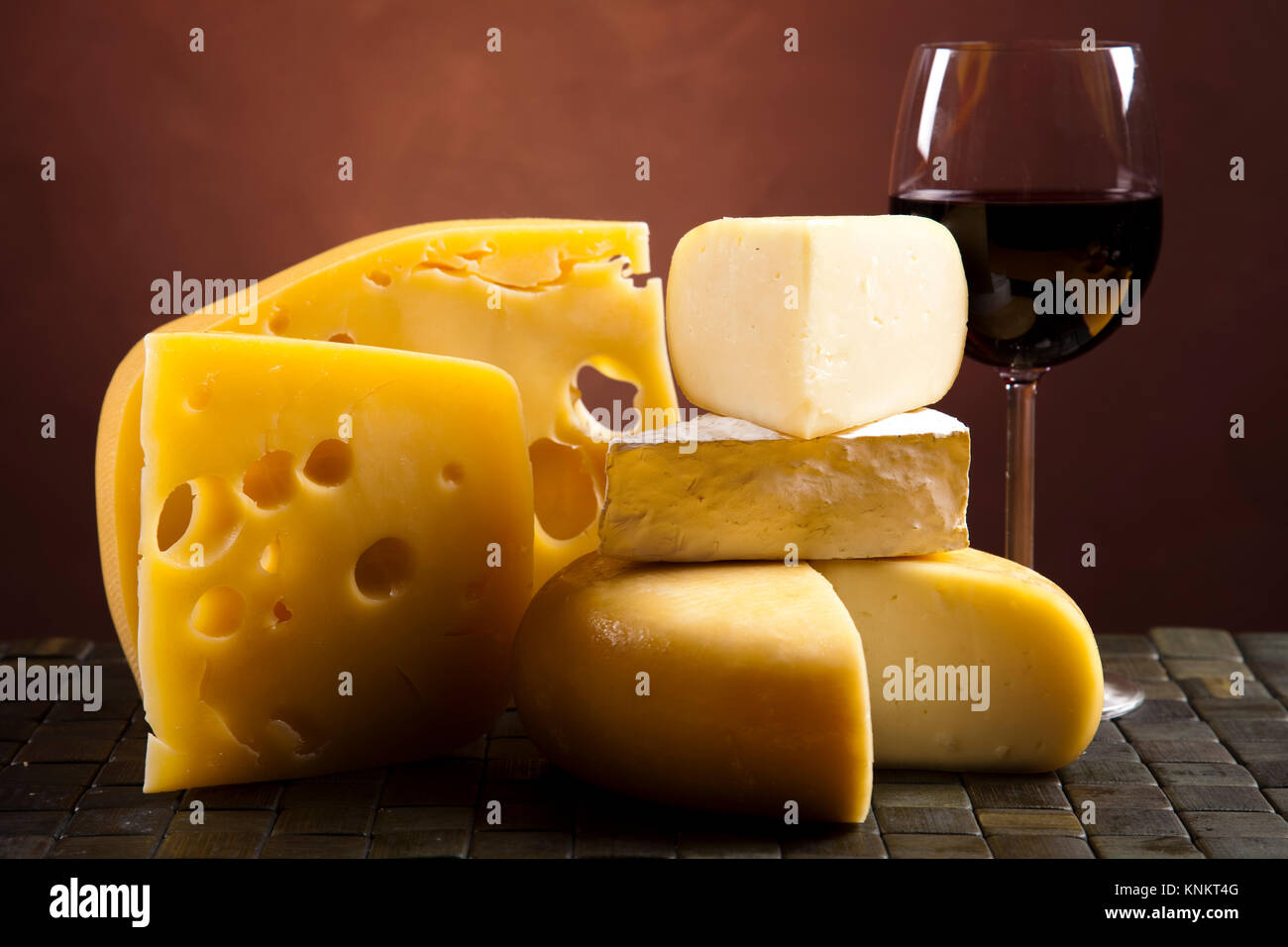 Cheese and wine, saturated ambient rural theme Stock Photo - Alamy