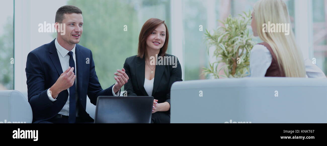 Business people working around table in modern office Stock Photo - Alamy