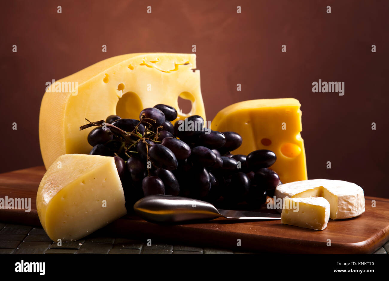 Cheese composition, saturated ambient rural theme Stock Photo - Alamy