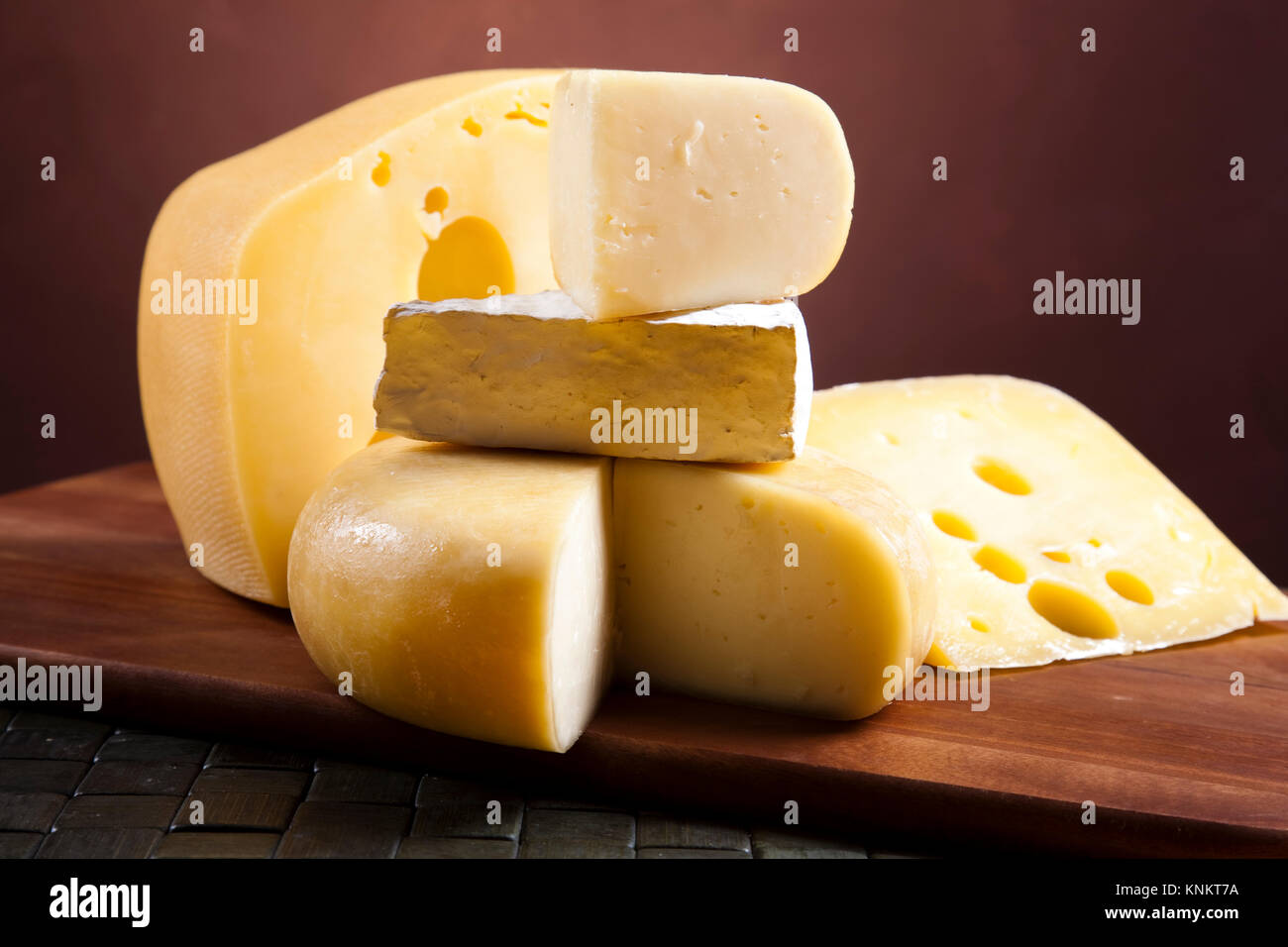 Cheese composition, saturated ambient rural theme Stock Photo - Alamy