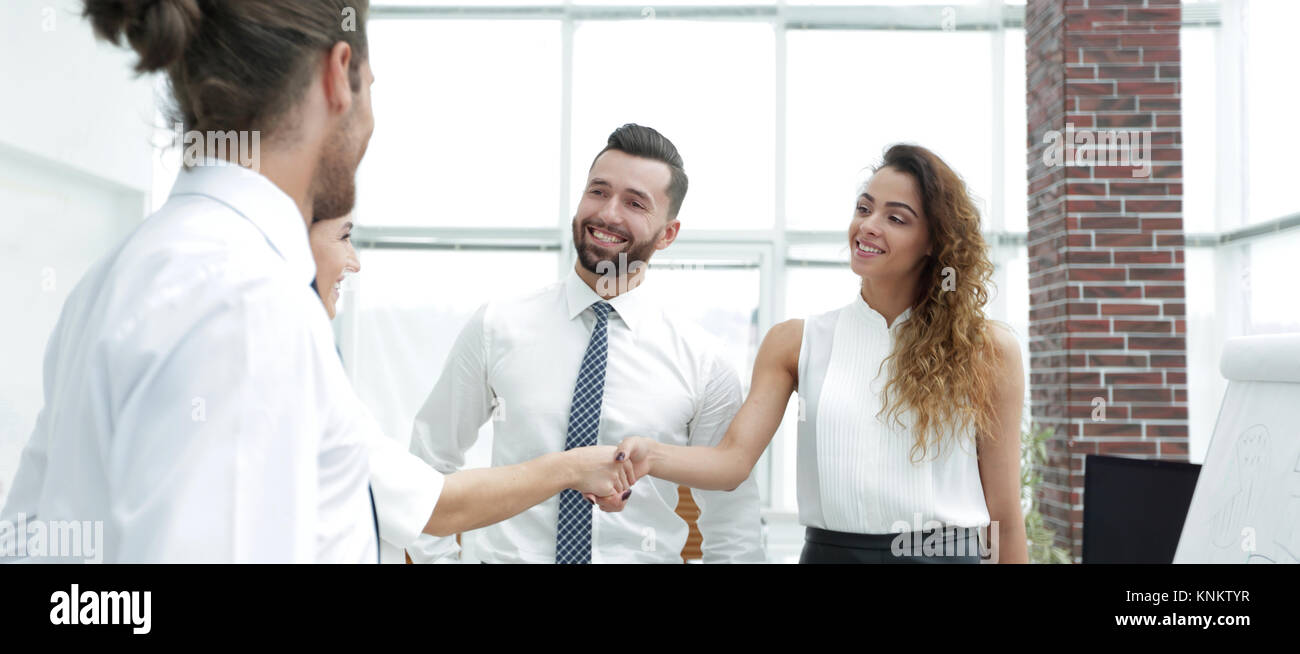 business women greet each other with a handshake Stock Photo - Alamy