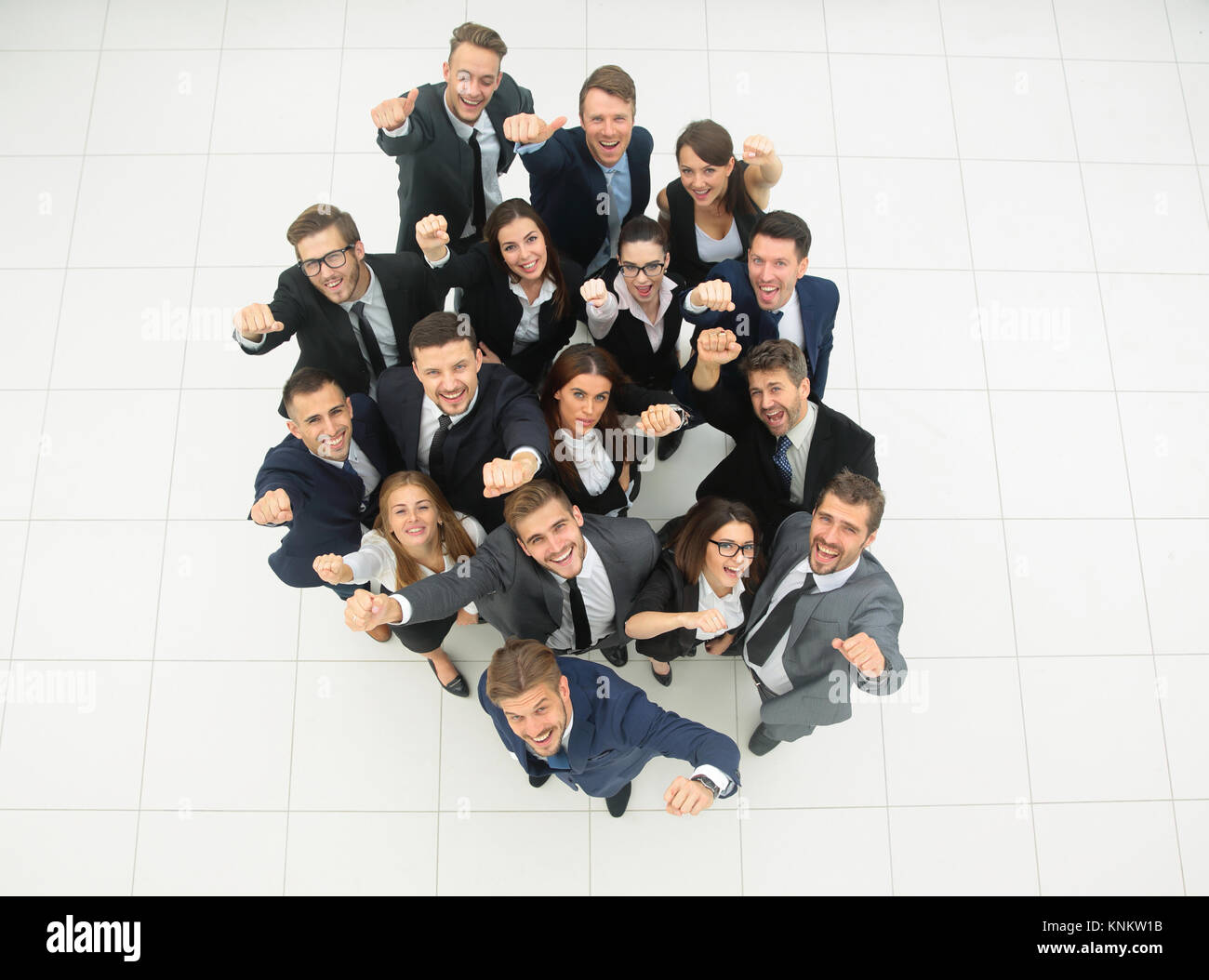 concept of success. numerous triumphant business team Stock Photo - Alamy