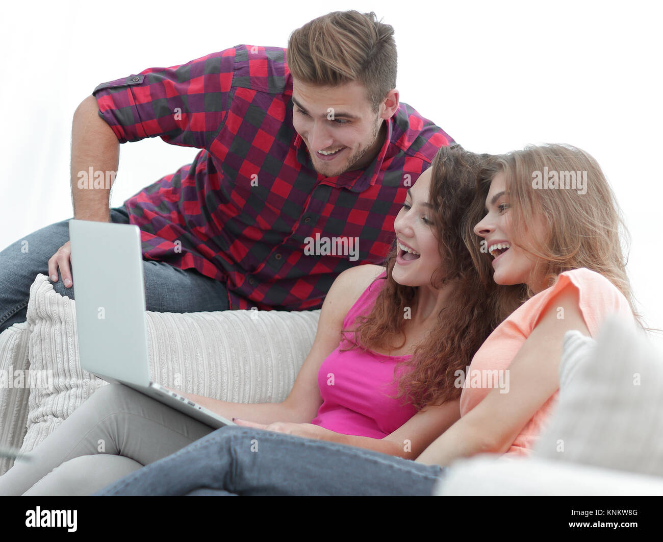 group of young people watching videos on the laptop Stock Photo - Alamy
