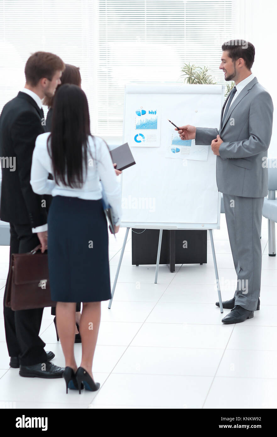 senior Manager makes a presentation in the office Stock Photo - Alamy