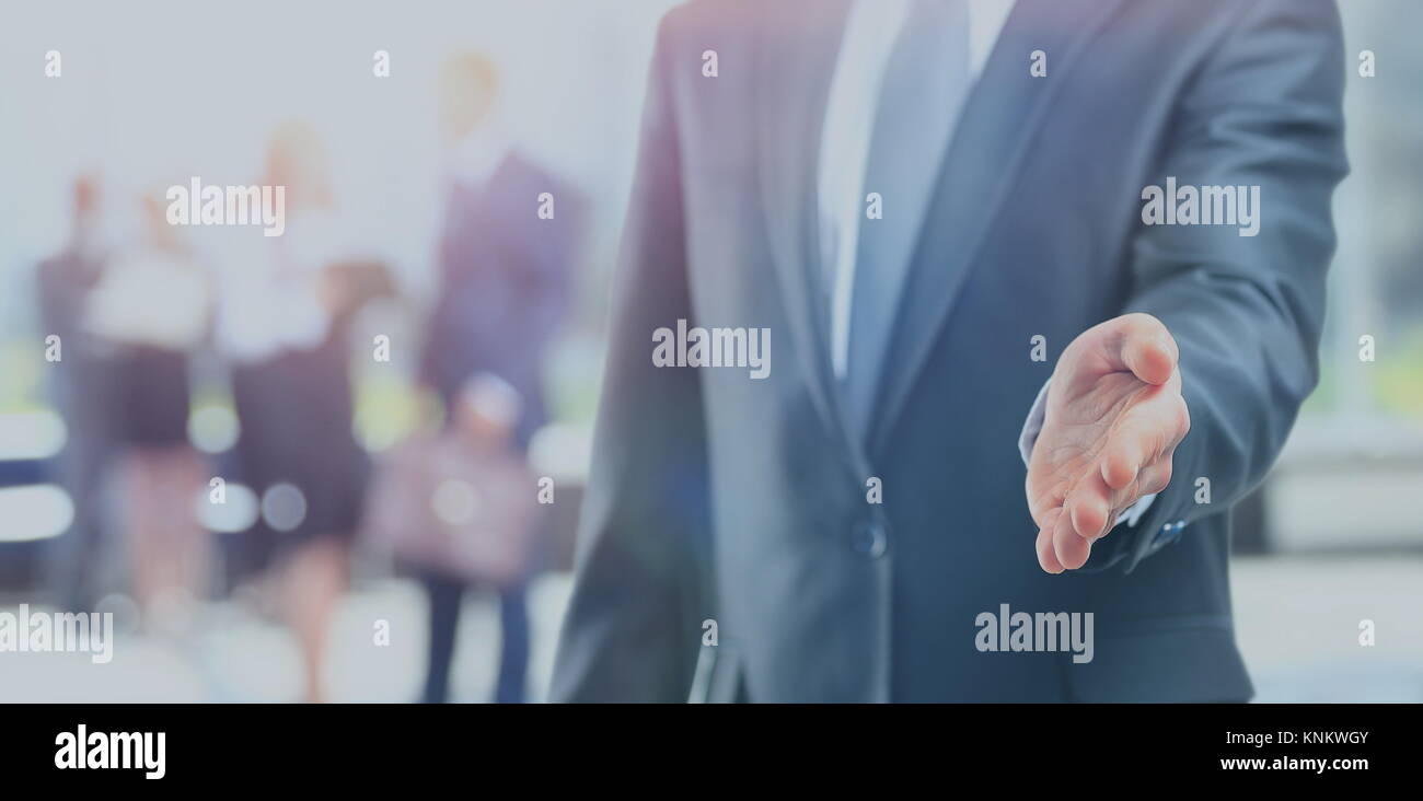 A business man with an open hand ready to seal a deal Stock Photo - Alamy