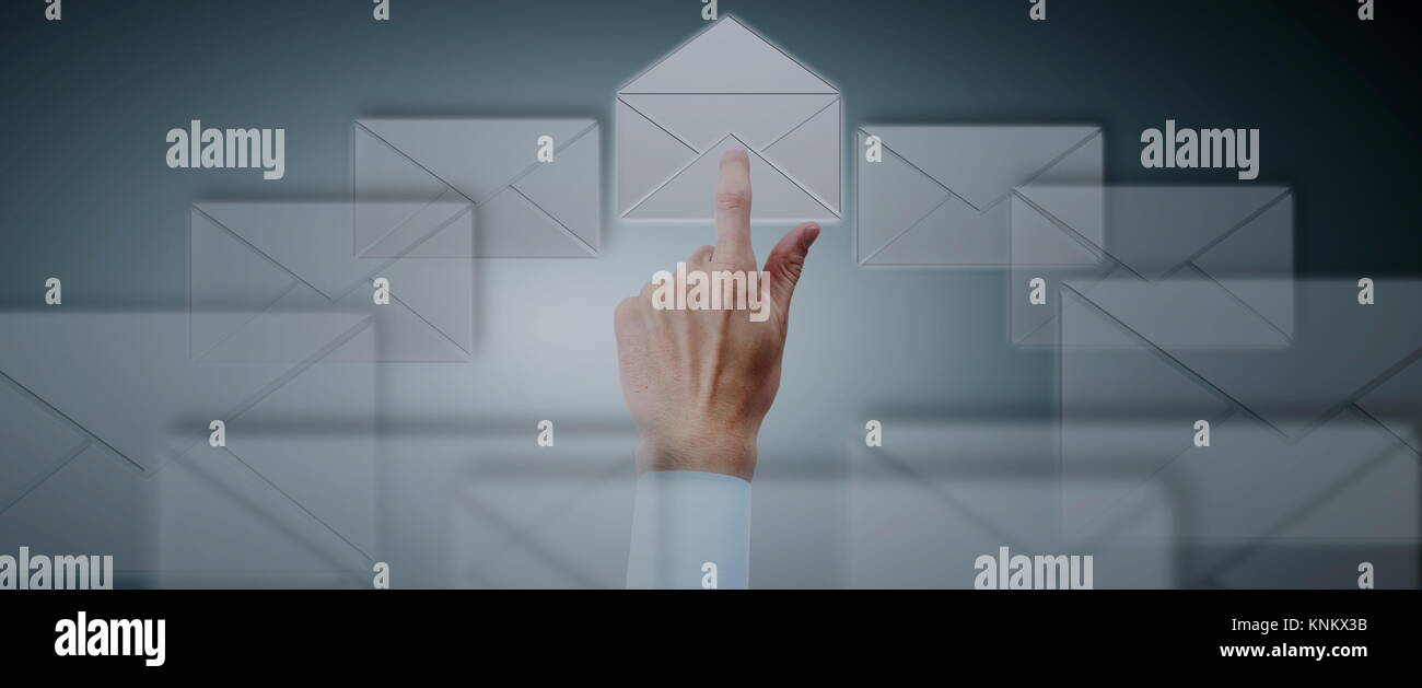 Businessman choosing e-mail icons Stock Photo - Alamy